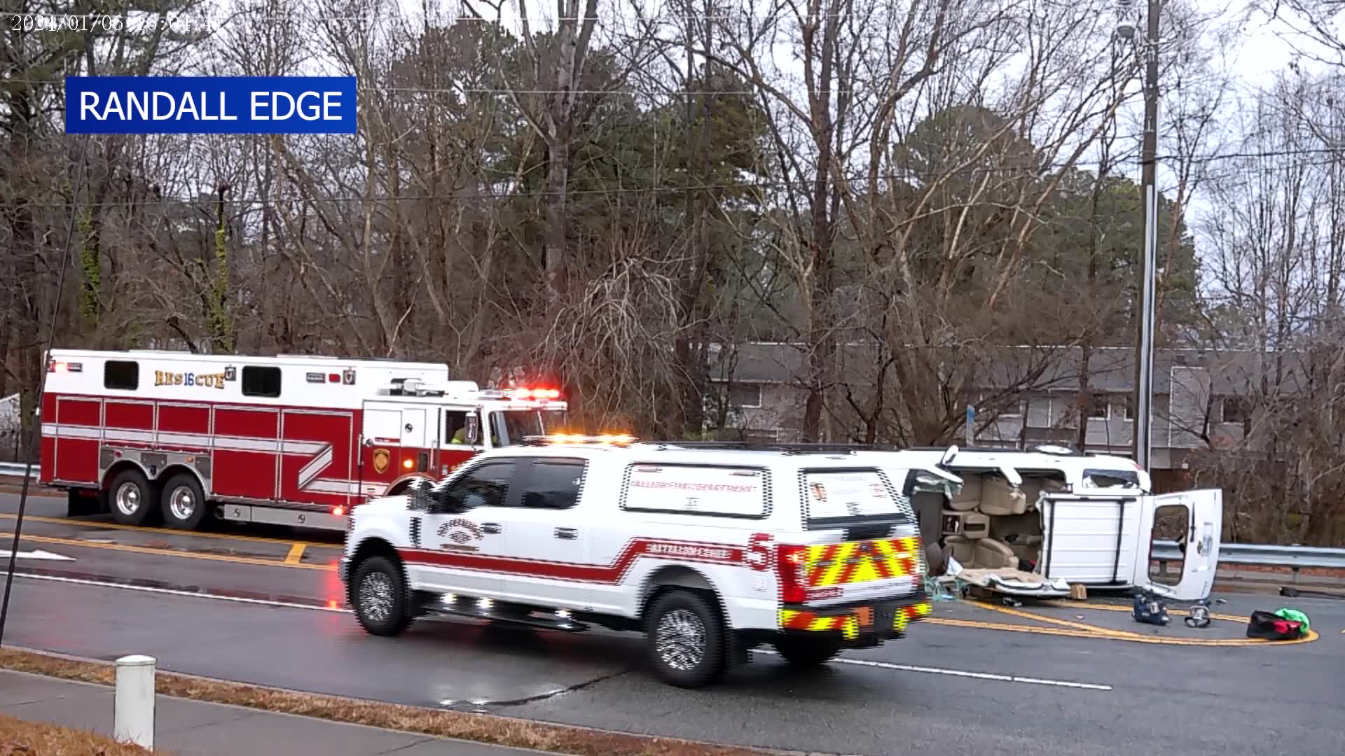 RAW VIDEO: Roof cut from flipped SUV; occupants trapped in Raleigh ...