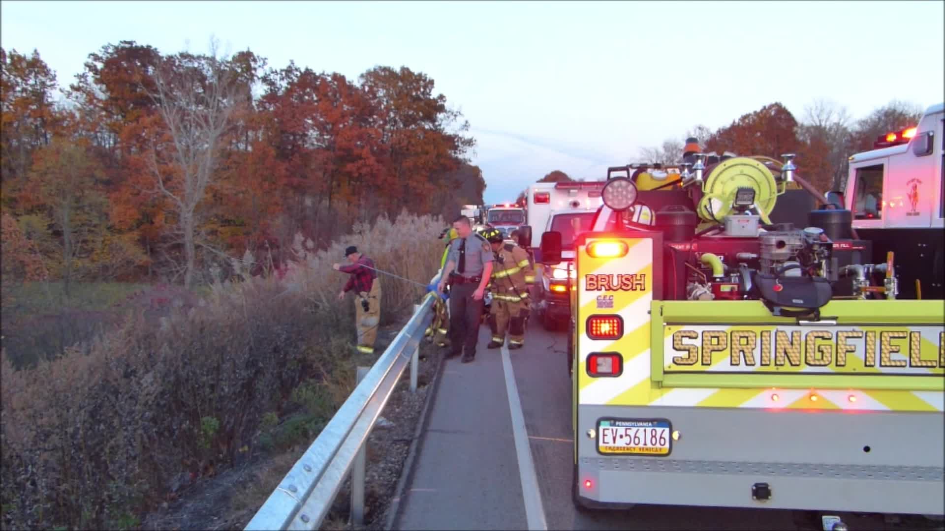 Rescue crews rappel to save driver after semi goes off I-90 into ravine ...