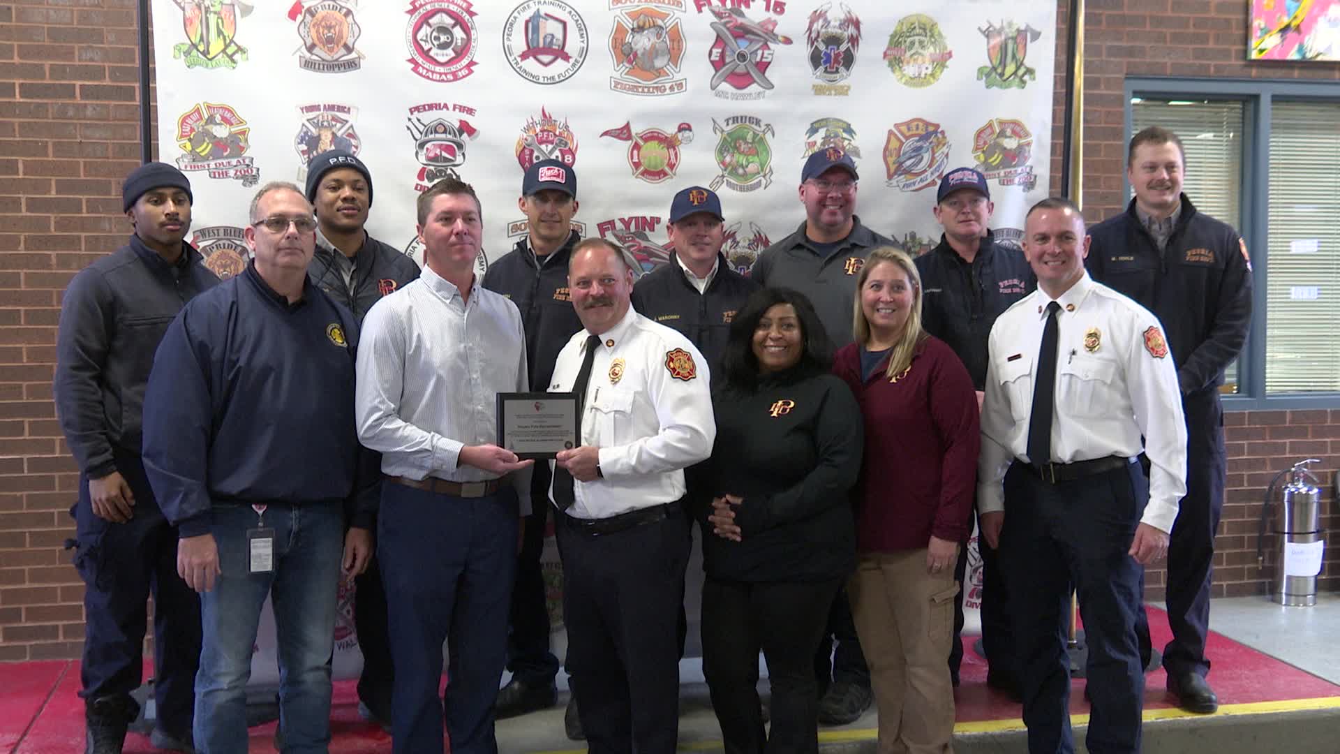 Peoria Fire Department commended with a plaque for safety milestone ...