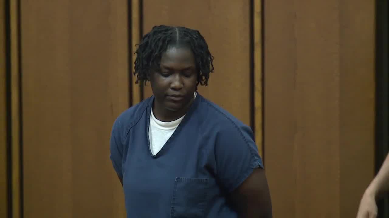 Woman accused of killing Cleveland officer considers firing lawyers ...