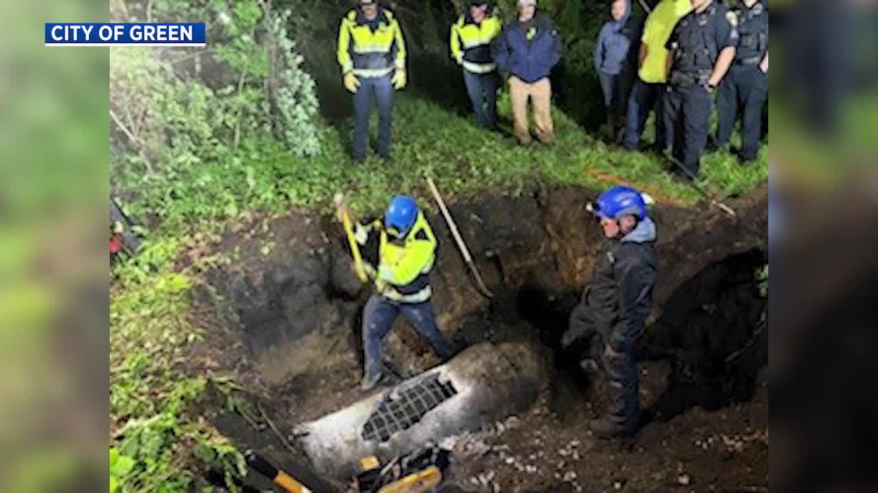 Rescuers sledgehammer into Clinton drain pipe after man gets stuck ...