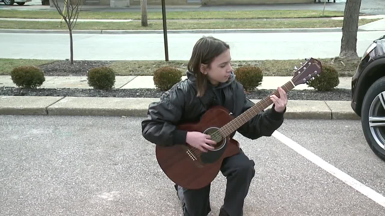 ‘Overjoyed’: Mayfield Heights police buy 12-year-old scam victim guitar ...