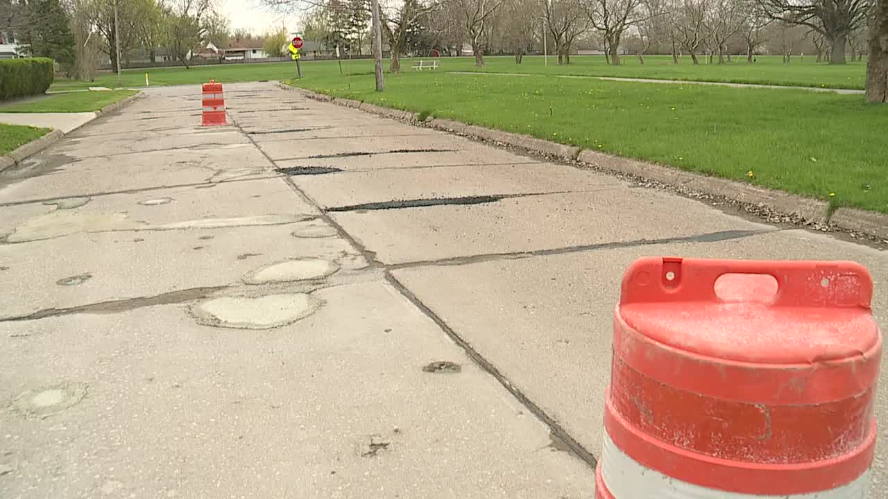 Frustrated Lorain residents patch up potholes in neighborhood – Fox 8 ...